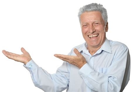 Premium Photo Happy Senior Man Showing Something Isolated On White
