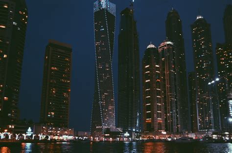 Low Angle Photography Of High Rise Buildings At Night Hd Wallpaper