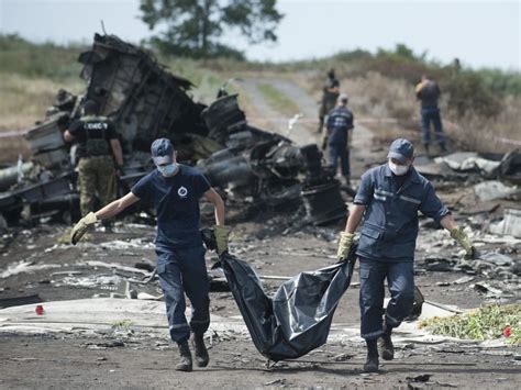 Bodies From Mh17 Crash Begin Journey To Amsterdam Ya Libnan