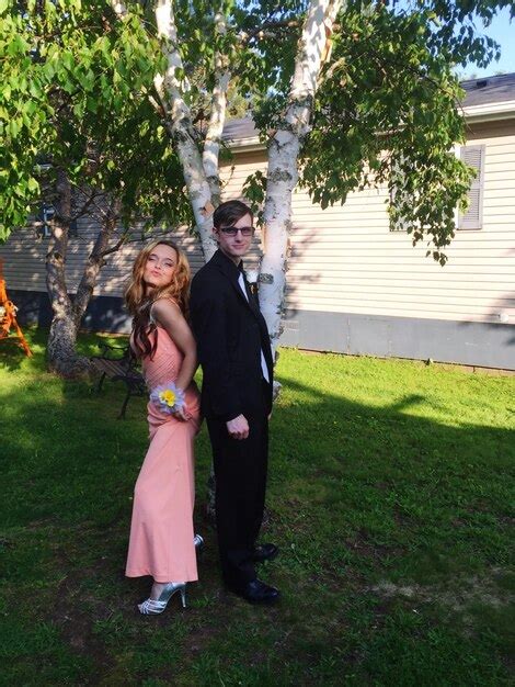 Premium Photo Full Length Of Cheerful Teenage Couple Standing On