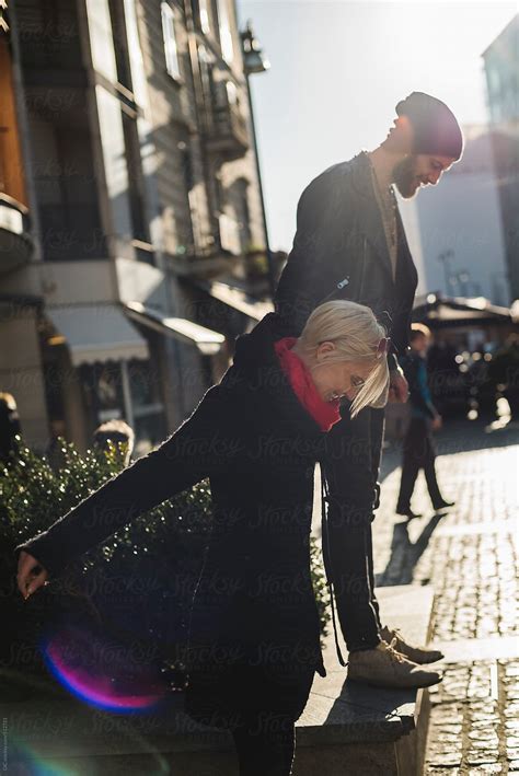 «young Couple Having Fun In The City Del Colaborador De Stocksy