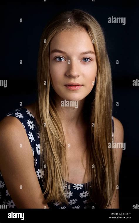 Low Key Portrait Of Pretty Girl With Fresh Healthy Skin And Straight
