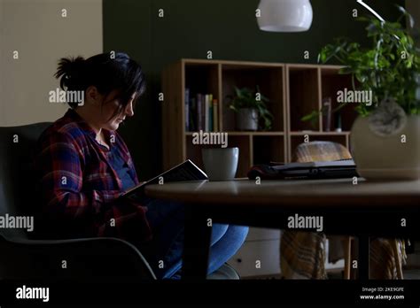 Tranquil Silent Depressed Black Haired Mature Woman Read Book In