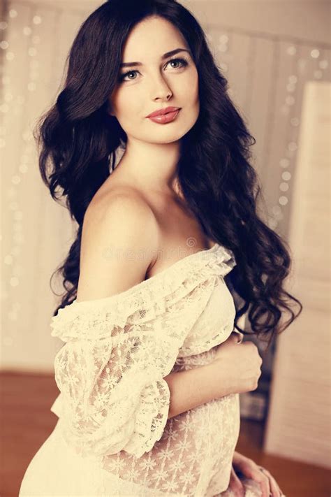 Beautiful Pregnant Woman With Long Dark Hair Wearing Lace Dress Stock