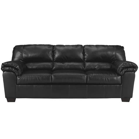 A Black Leather Couch On A White Background