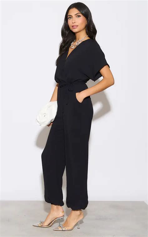 Batwing Sleeve Elasticated Waist Jumpsuit In Black Jenerique