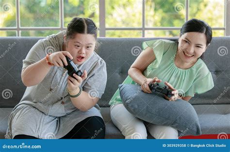Asian Happy Funny Lovely Mother And Young Chubby Down Syndrome Autistic