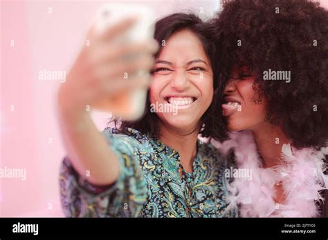 Couple Of Young South Asian Woman And African Amercian Woman Having Fun