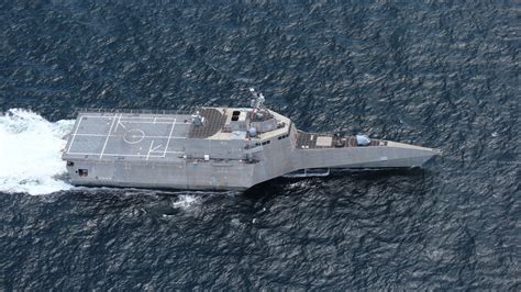 u s navy sails warship near disputed islands in south china sea for