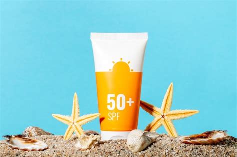 Premium Photo Sunscreen In An Orange Tube On Blue Background With
