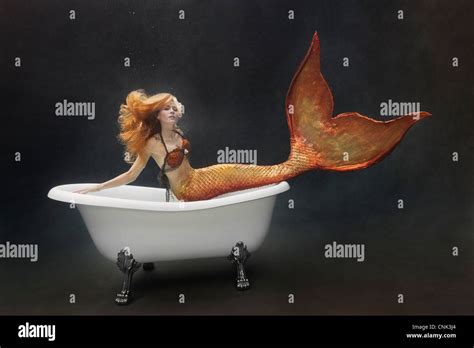 Mermaid Underwater Sitting On The Edge Of Her Victoria Albert Bathtub
