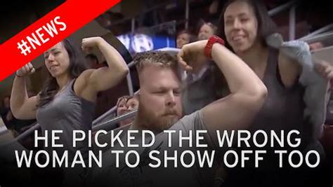 this muscle man s attempt to impress the ladies at a football game