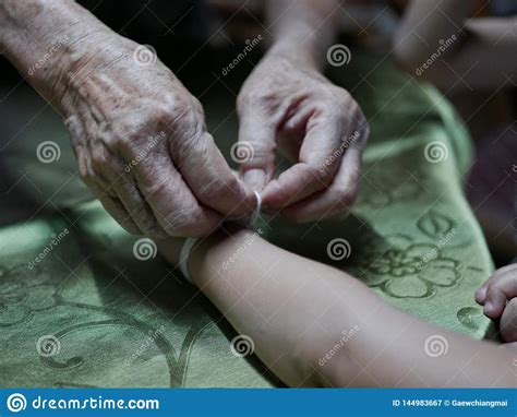 Hands Of Thai Masseuse Woman Getting Massage Barefoot For Customer
