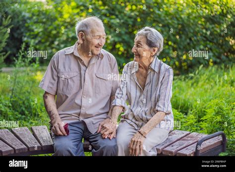 Elderly Couple In Love Senior Husband And Wife Holding Hands And