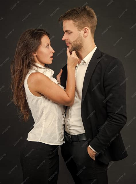 Premium Photo Sexy Man And Woman In Business Look On Black Background