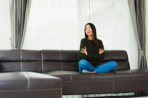 Free Photo Beautiful Portrait Young Asian Woman Sit Relax On Sofa