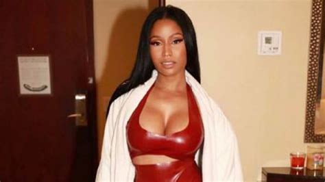Nicki Minaj Looks Like A Superhero In A Sexy Red Latex Ensemble Pics