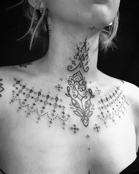 A Womans Chest With An Intricate Design On The Top And Bottom Part Of