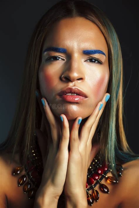 Young Pretty Modern African American Girl With Bright Fashion Makeup
