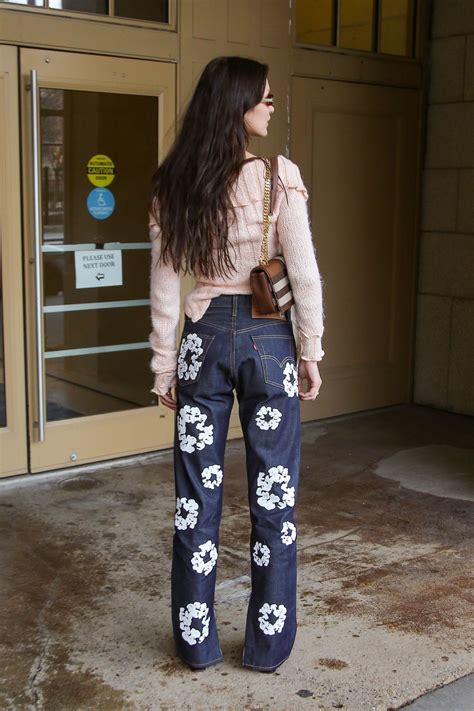 Bella Hadid Wears Denim Tears X Levis Cotton Wreath Jean With A Blush