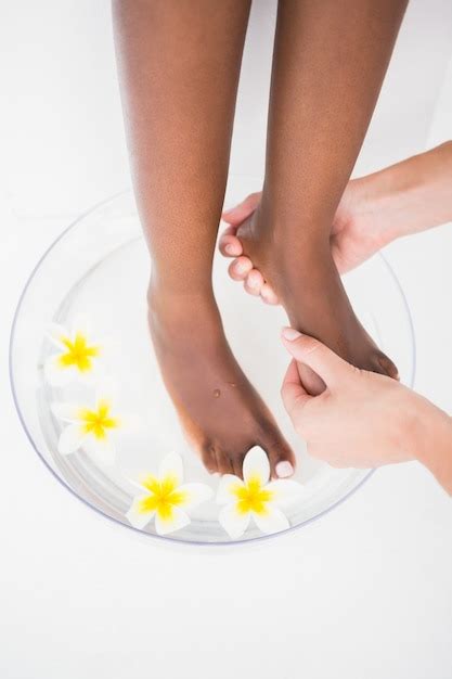 Premium Photo Woman Enjoying A Foot Massage
