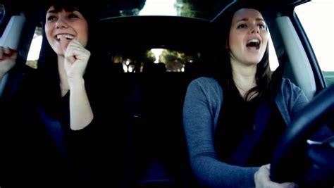 Beautiful Women Driving Singing Dancing Car Stock Footage Video 100