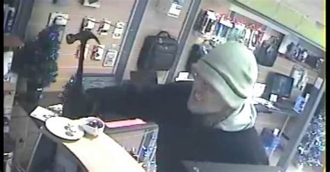 Watch Hammer Wielding Robber Demand Cash From Terrified Shop Worker In