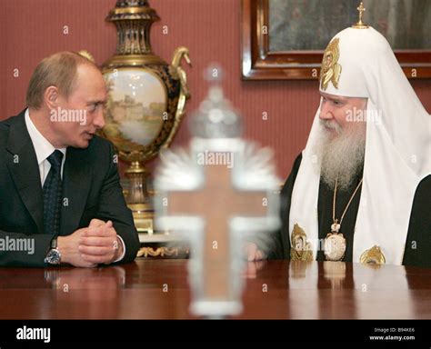 President Vladimir Putin And Patriarch Alexy Ii Of Moscow And All