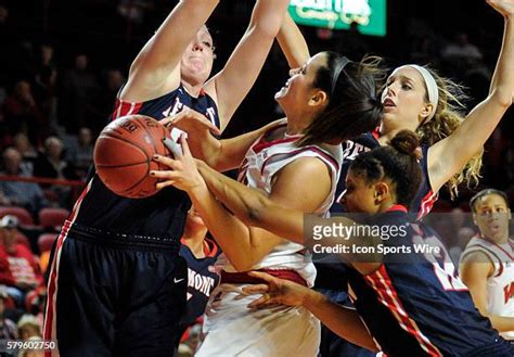 Triple Teamed Photos And Premium High Res Pictures Getty Images