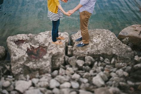 Couple Holding Hands By Stocksy Contributor Jess Craven Stocksy