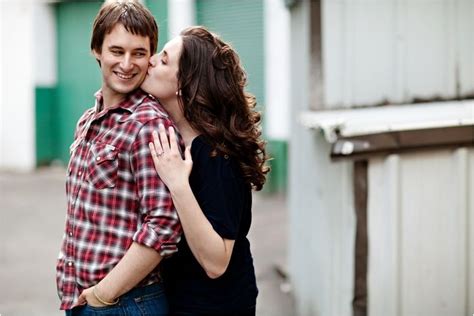 Super Adorable Girl Hugging Guy From Behind Kiss His Cheek As He