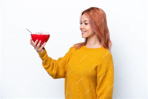 Premium Photo Young Russian Girl Holding A Bowl Of Cereales Isolated