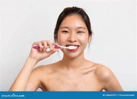 Portrait Of Young Asian Woman Brushing Her Teeth Stock Image Image Of
