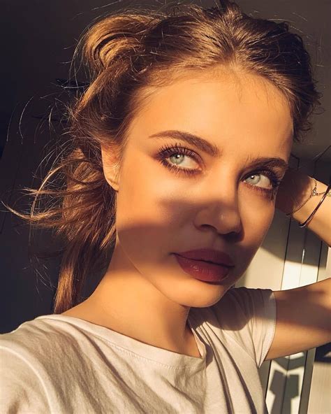 Xenia Tchoumitcheva Thursday A White T Shirt Messy Hair And Grey