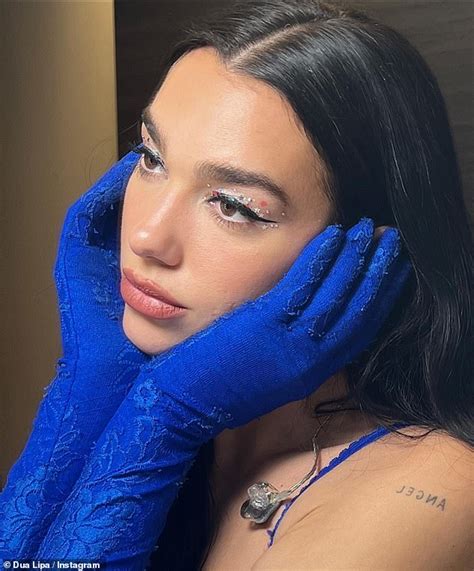 Dua Lipa Flashes Her Toned Abs In A Black Lace Bra As She Shares