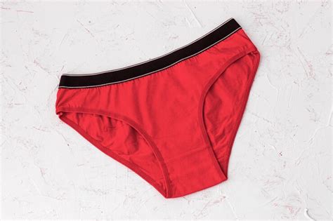 Premium Photo Red Cotton Panties On The White Structured Background