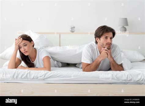 Unhappy Upset Offended Angry Millennial European Wife And Husband Lying