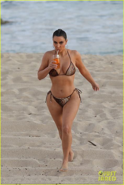 Kim Kardashian Flaunts Her Curves In A Bikini See The Beach Photos