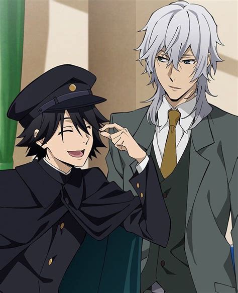 Two Anime Characters Dressed In Black And White One Is Holding The