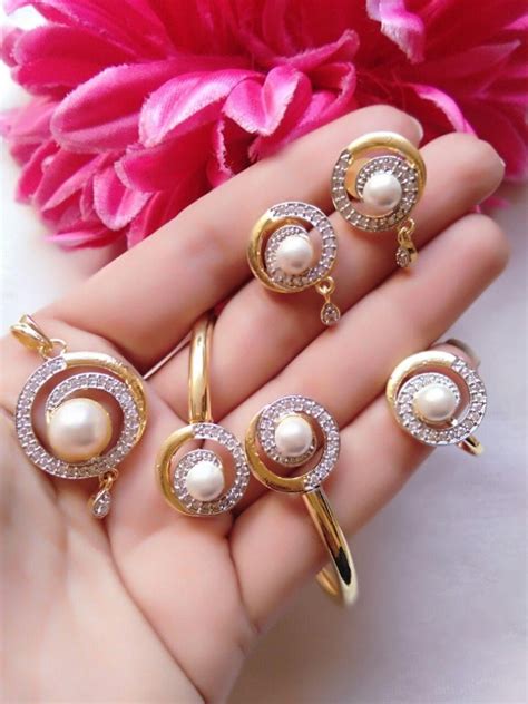 Ankur Delightful Gold Plated American Diamond Round Shaped Combo