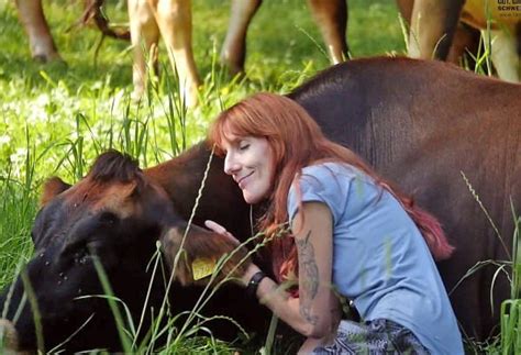 cuddling with cows is the cutest form of therapy