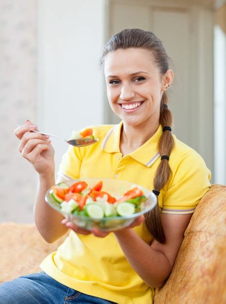 Free Photo Smiling Healthy Girl Eating Veggie Salad