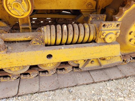 used deere 450e dozer track adjuster recoil spring gulf south equipment