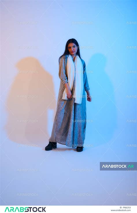 Portrait Of A Saudi Arabian Gulf Woman Wearing An Elegant Colorful