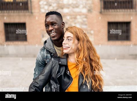 Multiethnic Young Couple Having Romantic Moments Together In The Street