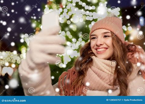 Young Woman Taking Selfie Over Christmas Tree Stock Image Image Of