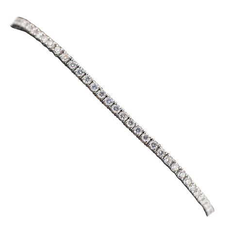 17 16 Carat Multi Shape Diamond 18 Karat White Gold Tennis Bracelet At