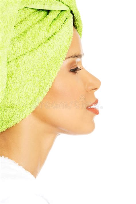 Profile Of Attractive Woman Wrapped In Towel With Turban Stock Image