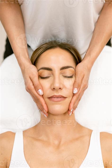 Middle Aged Woman Having A Head Massage In A Beauty Salon 4676405