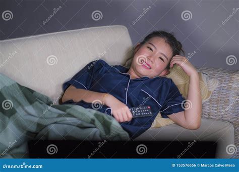 Young Beautiful Happy And Relaxed Asian Chinese Woman At Home Living
